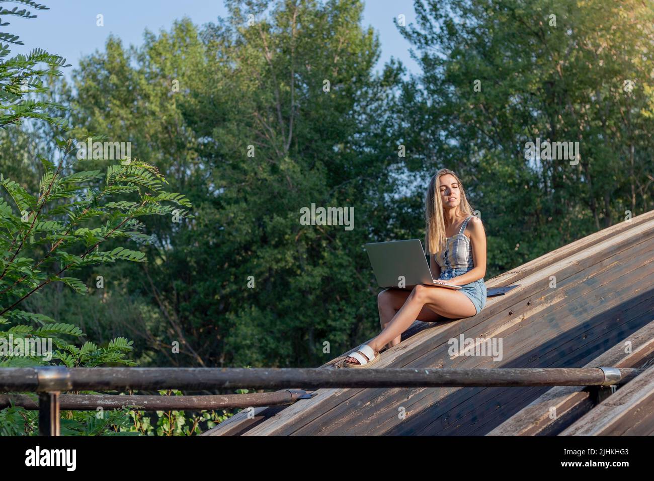 Beautiful female freelancer working outdoors hi-res stock photography ...