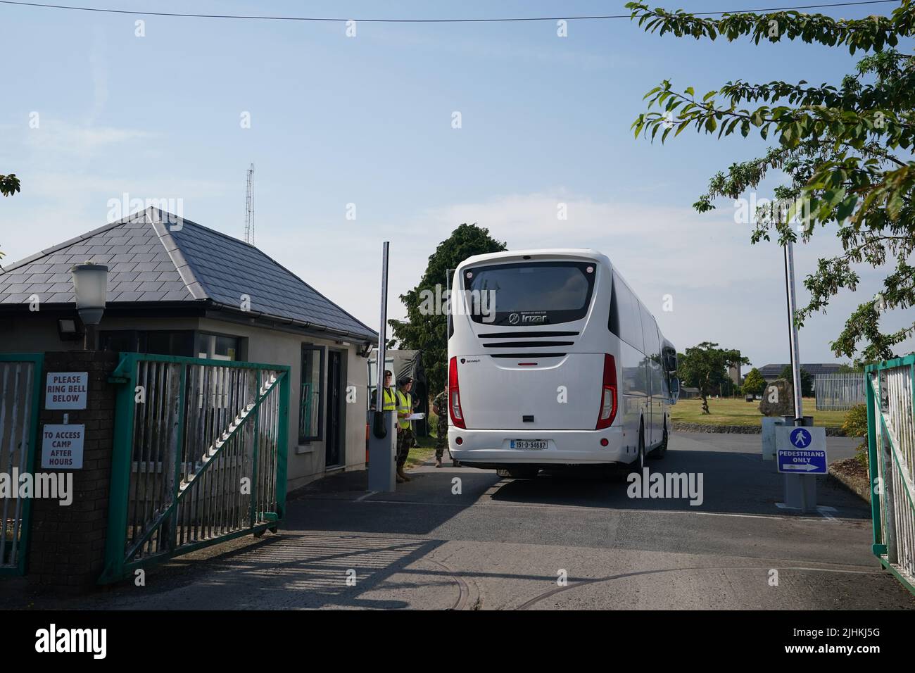 A coach of Ukrainian refugees arrives at Gormanston military camp in Co ...
