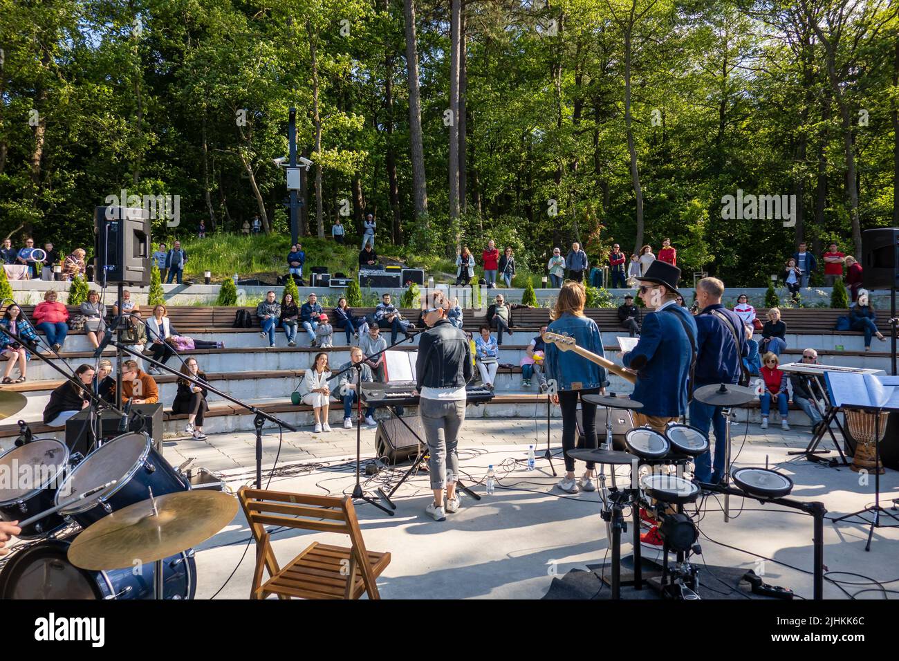 Anonymous band in front of audience Stock Photo - Alamy