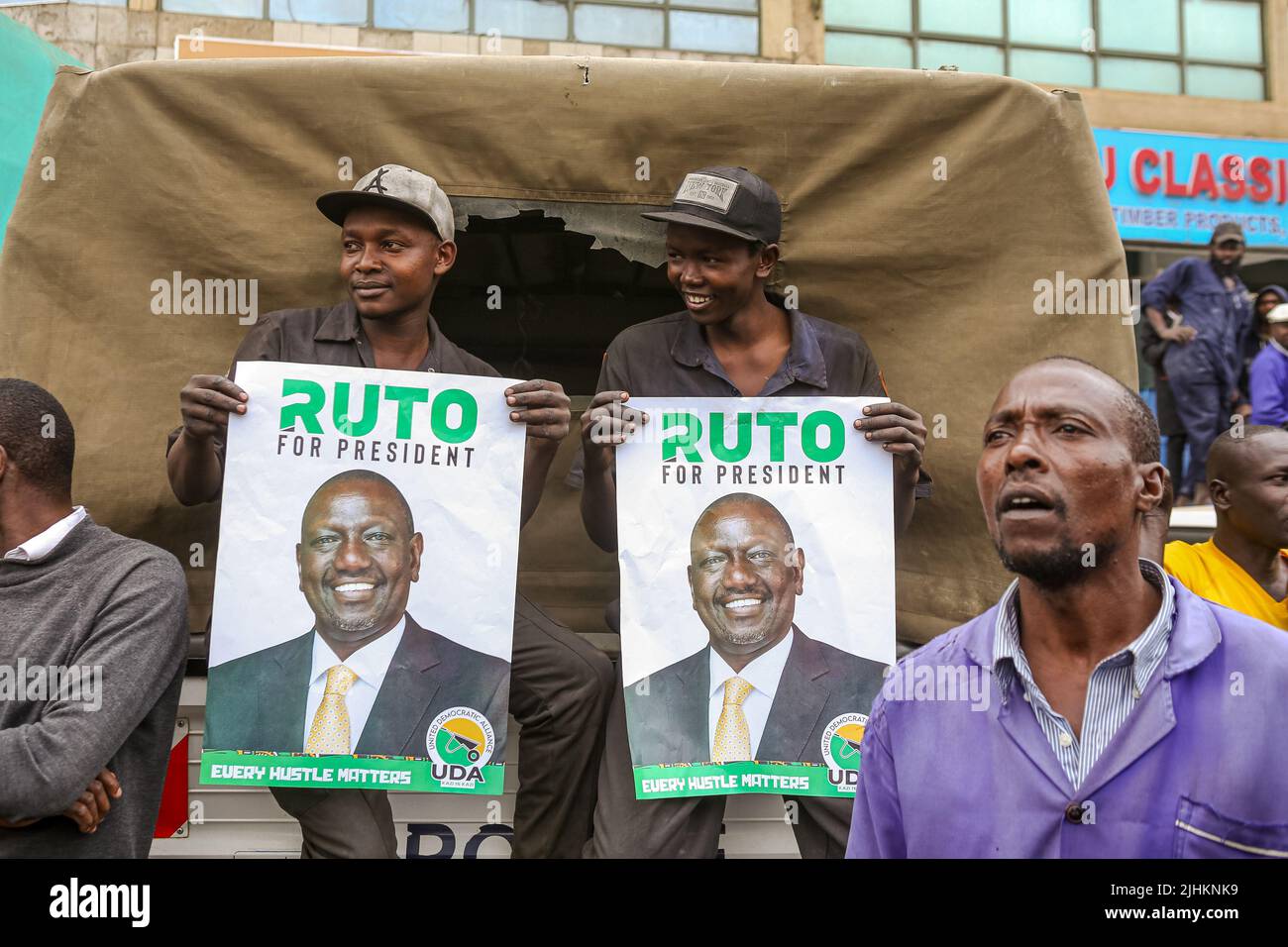 Men with posters hi-res stock photography and images - Alamy