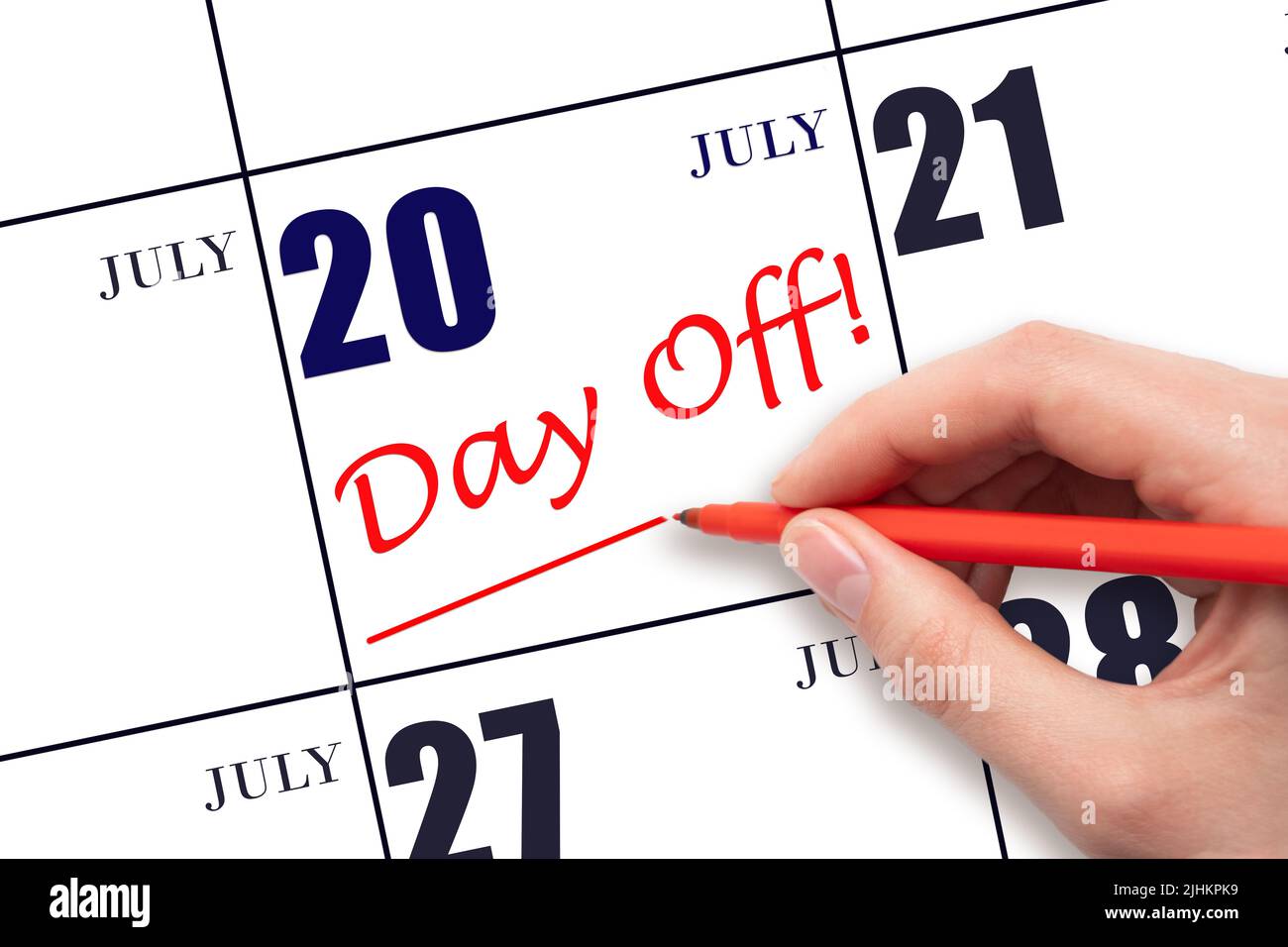 20th day of July. Hand writing text DAY OFF and drawing a line on ...