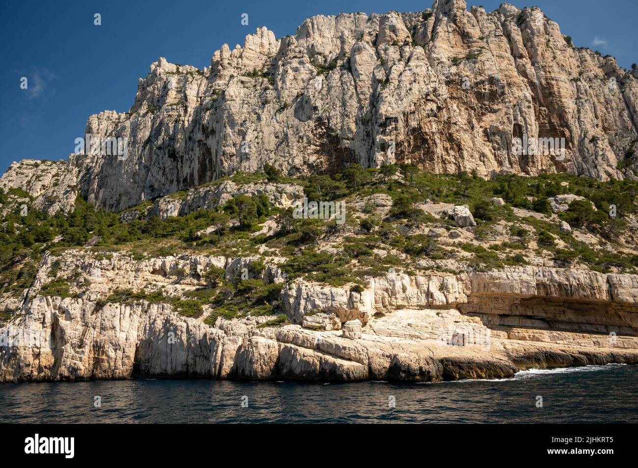 Limestone cliffs and blue sea near Cassis, boat excursion to Calanques ...