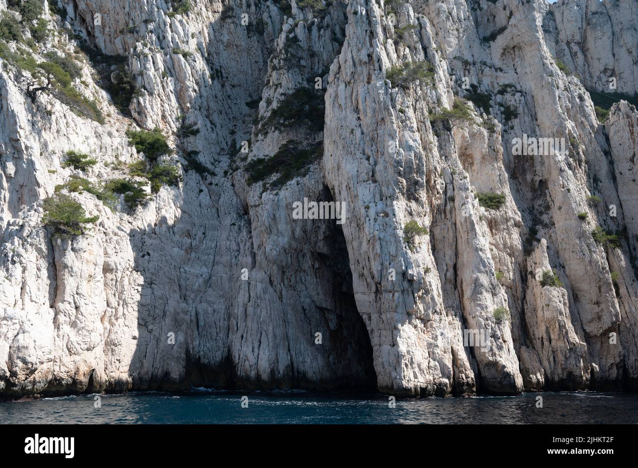 Limestone cliffs and blue sea near Cassis, boat excursion to Calanques ...