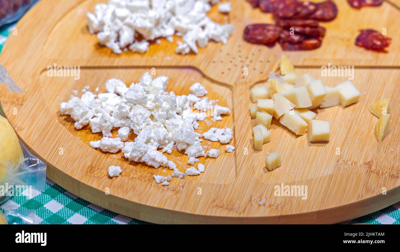 Pieces of Cheese Samples at Bamboo Board Tray Stock Photo - Alamy
