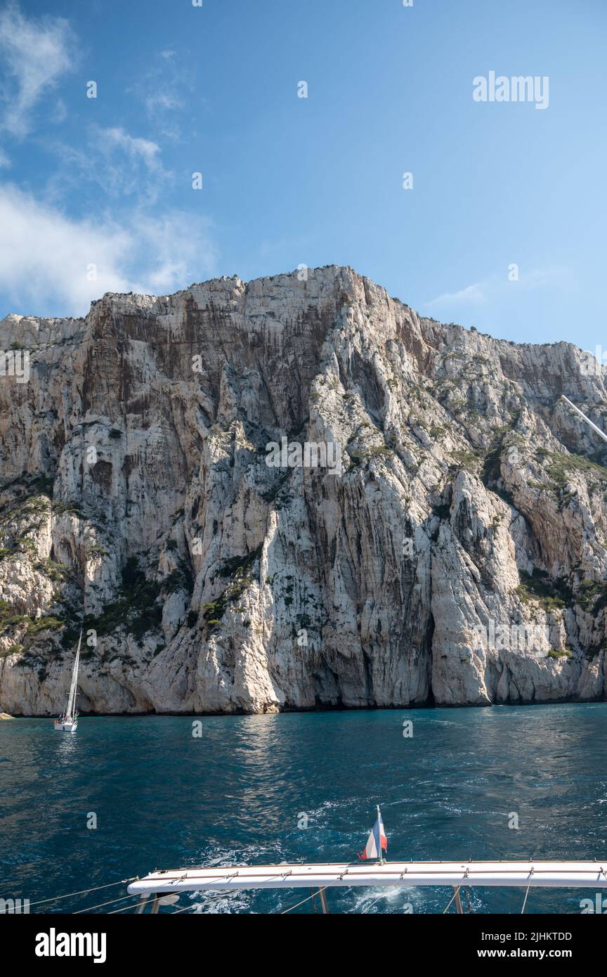Limestone cliffs and blue sea near Cassis, boat excursion to Calanques ...