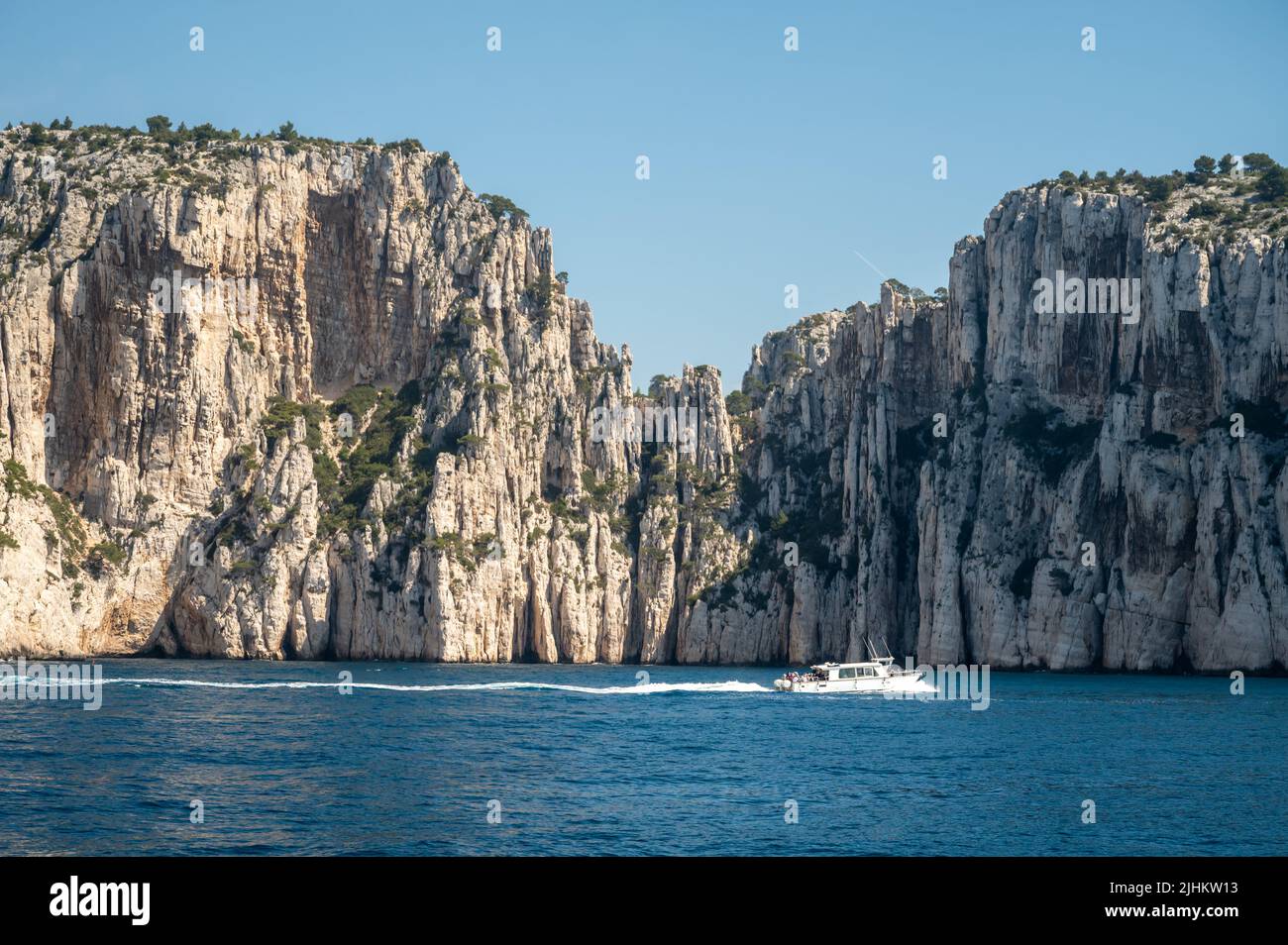 Limestone cliffs and blue sea near Cassis, boat excursion to Calanques ...