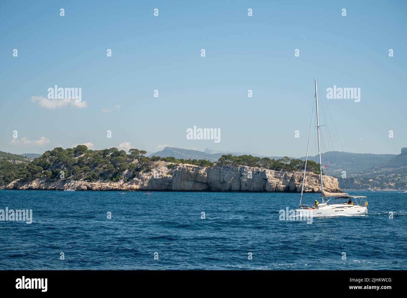 Limestone cliffs and blue sea near Cassis, boat excursion to Calanques ...
