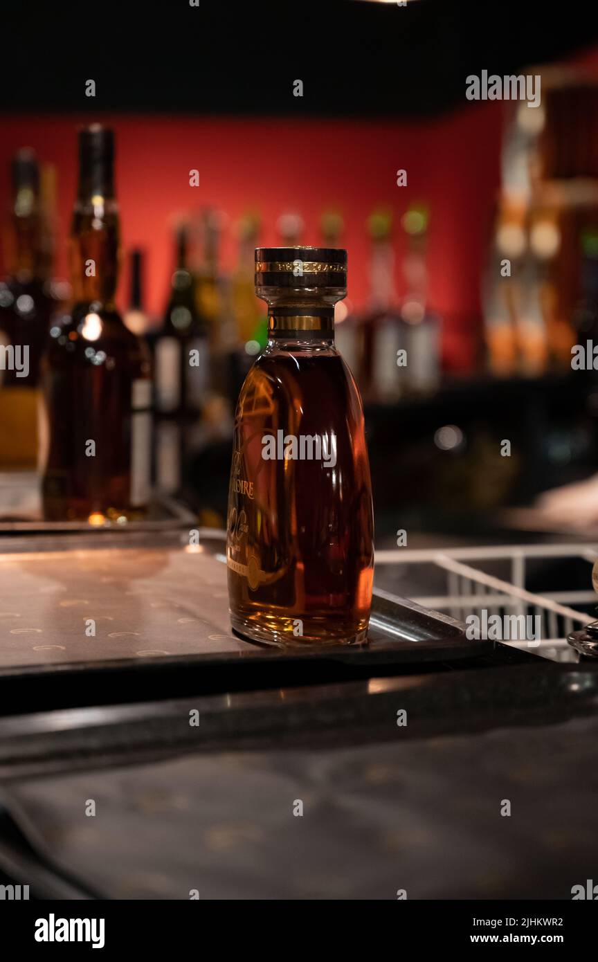 Different ages and colours of strong alcoholic apple drink calvados in ...
