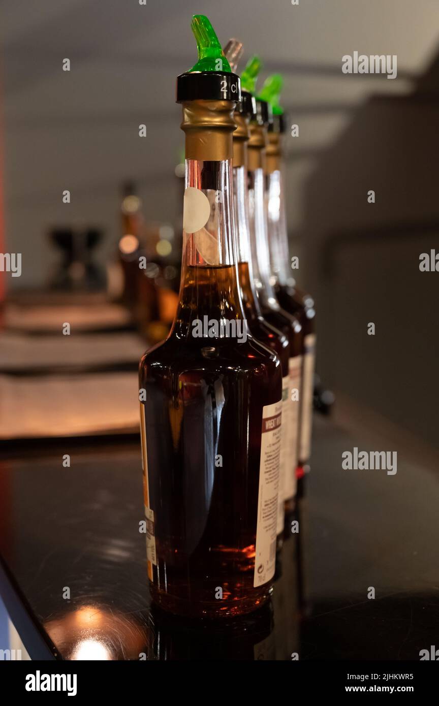 Different ages and colours of strong alcoholic apple drink calvados in ...