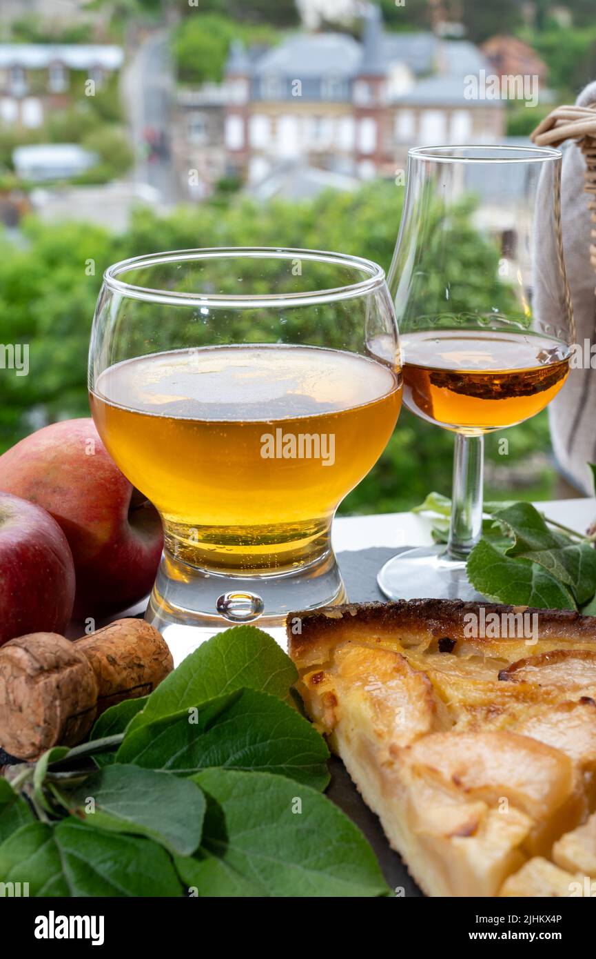 Apple products of Normandy region, homemade baked apple cake, glasses ...