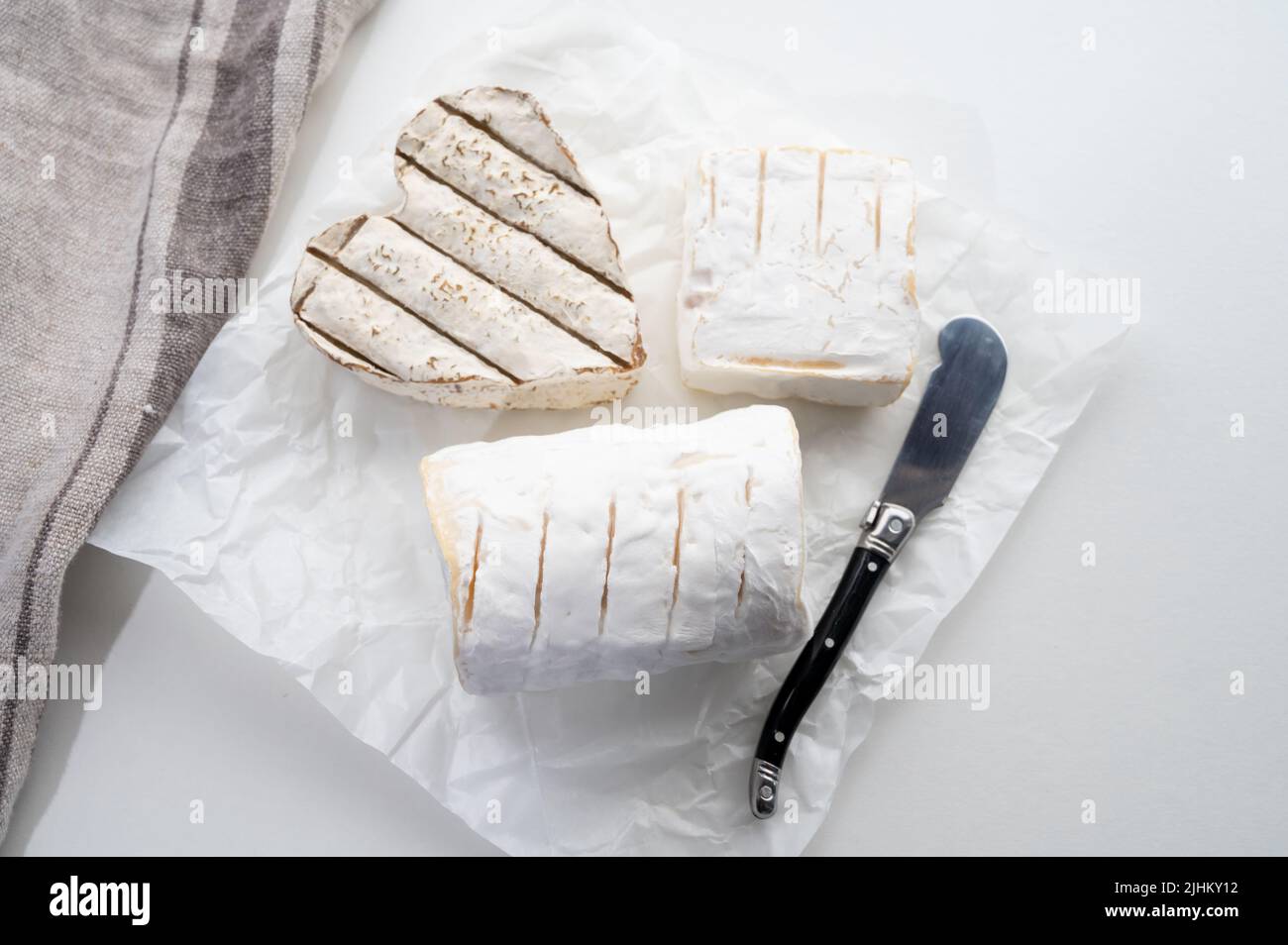 French cheeses heartshaped, squared and cylindrical neufchatel cow ...