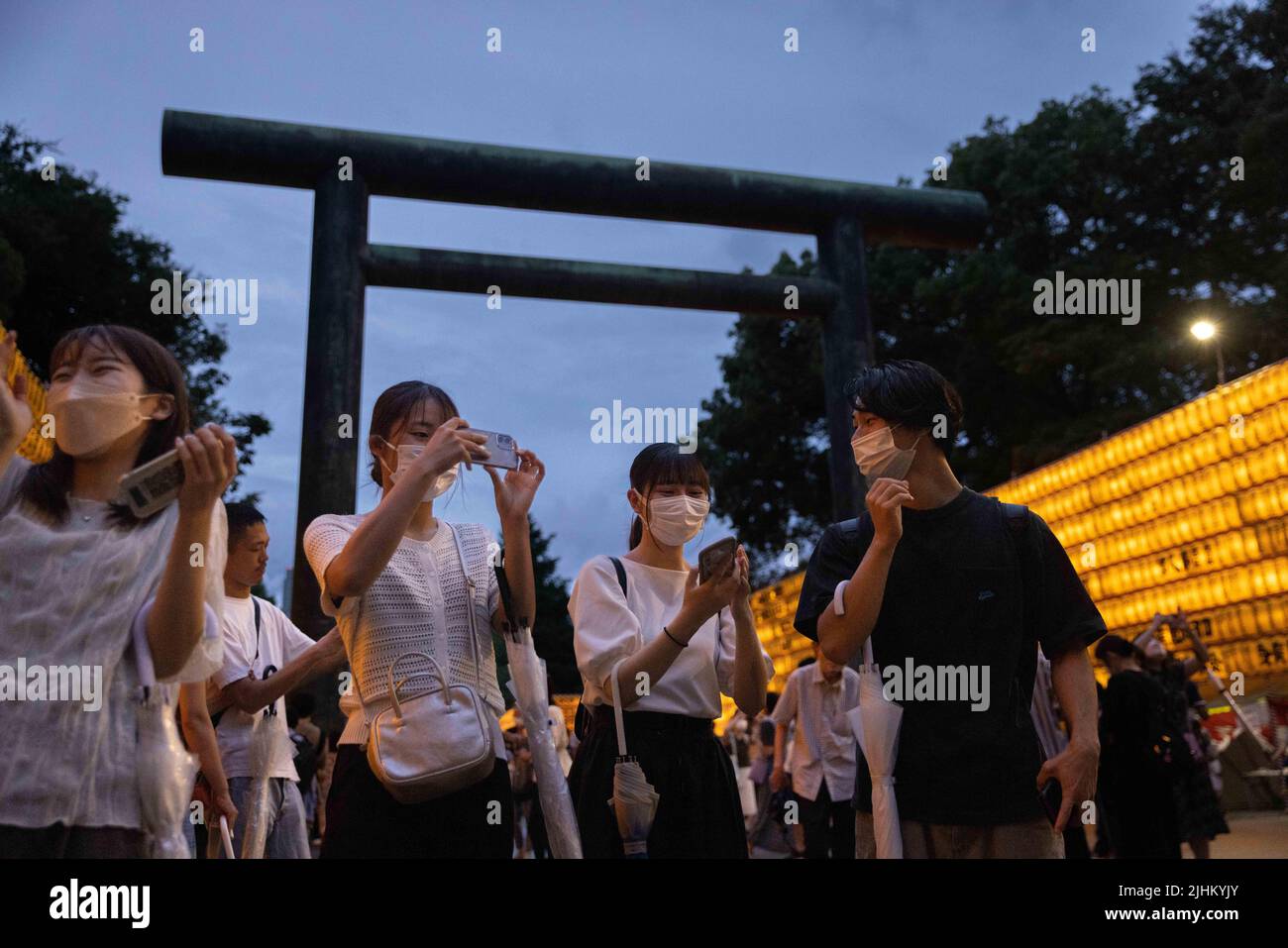 Tokyo, Japan. 16th July, 2022. Visitors take photos inside Yasukuni ...