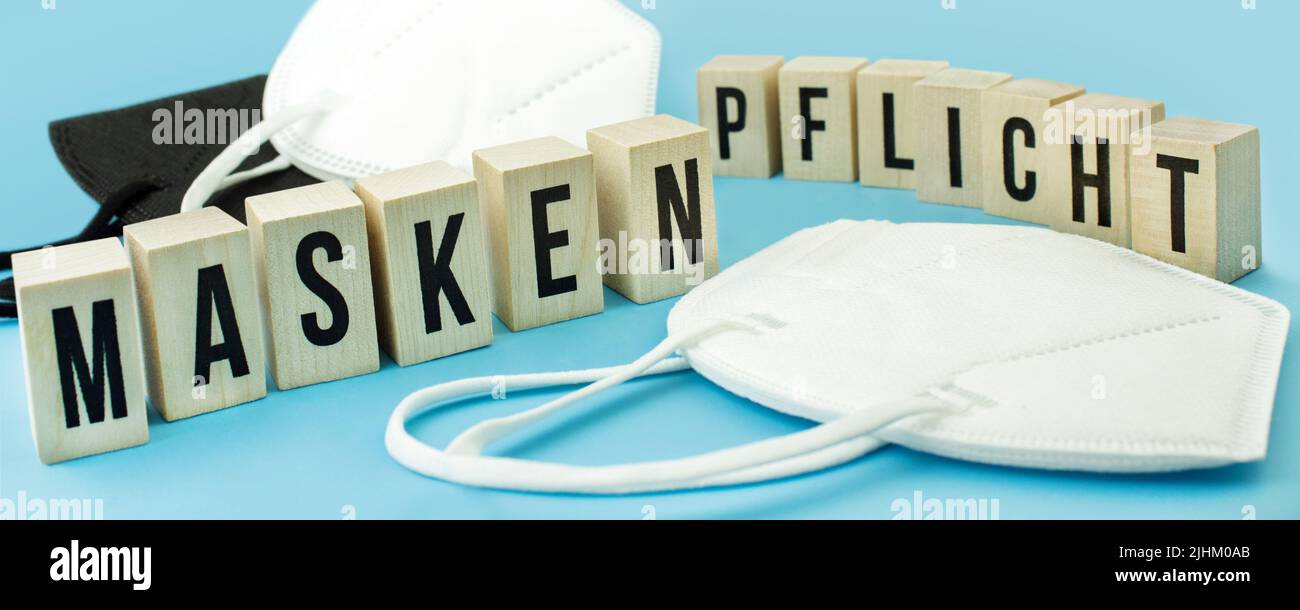 German Mandatory FFP2 Face Masks on blue background Stock Photo - Alamy