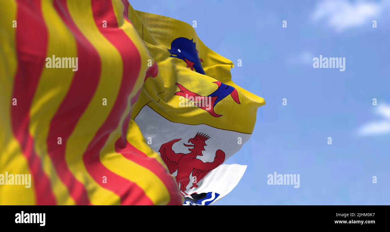 The region flag of Provence-Alpes-Côte d'Azur waving in the wind on a ...