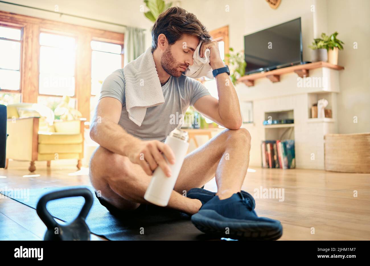 Muscular man wiping off sweat hi-res stock photography and images - Alamy