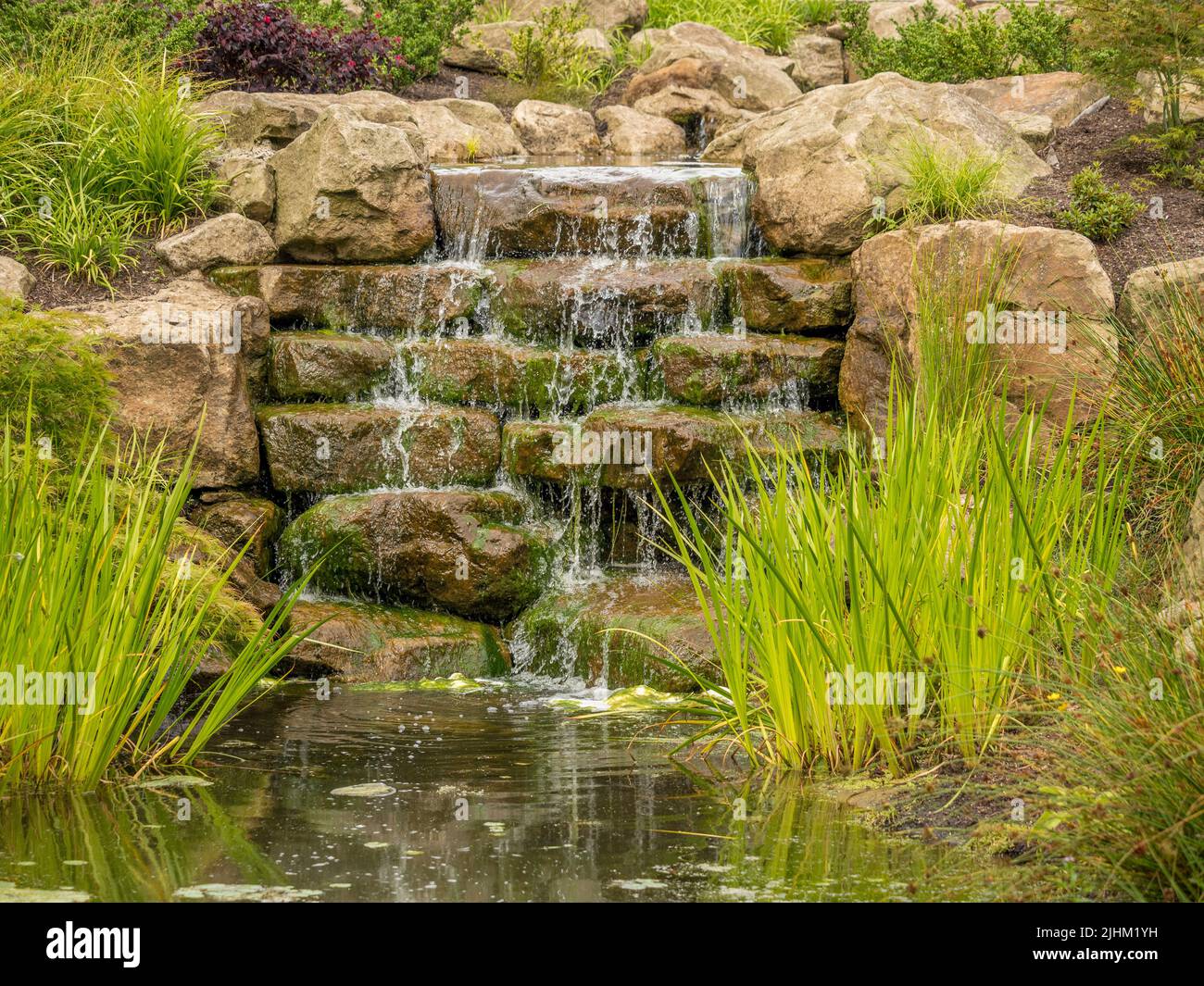 Weir in The Chinese Streamside Garden at RHS Bridgewater. Salford. UK ...
