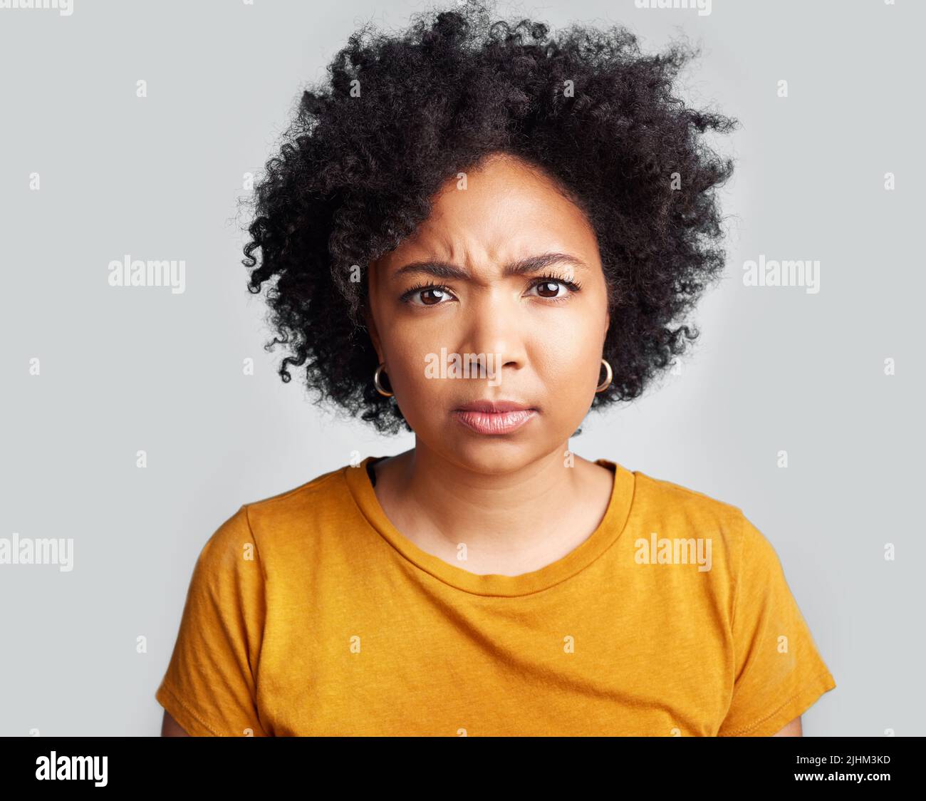 Serious stern looking hi-res stock photography and images - Alamy