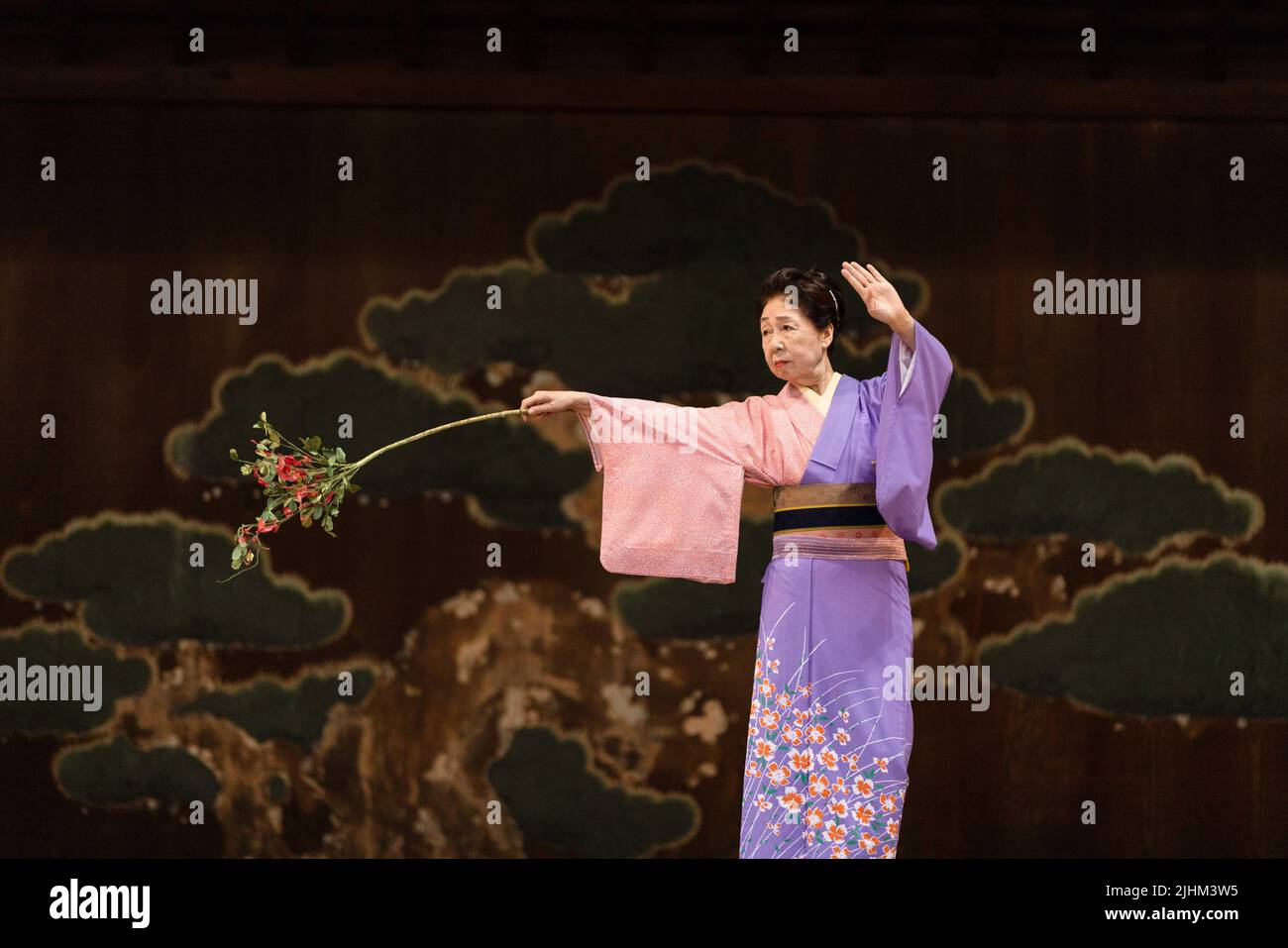 A woman performs a traditional dance during Mitama Matsuri held in ...