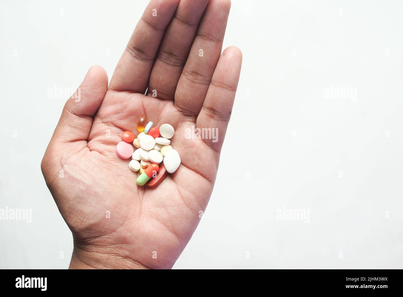 top view of medical pills on palm of hand Stock Photo - Alamy
