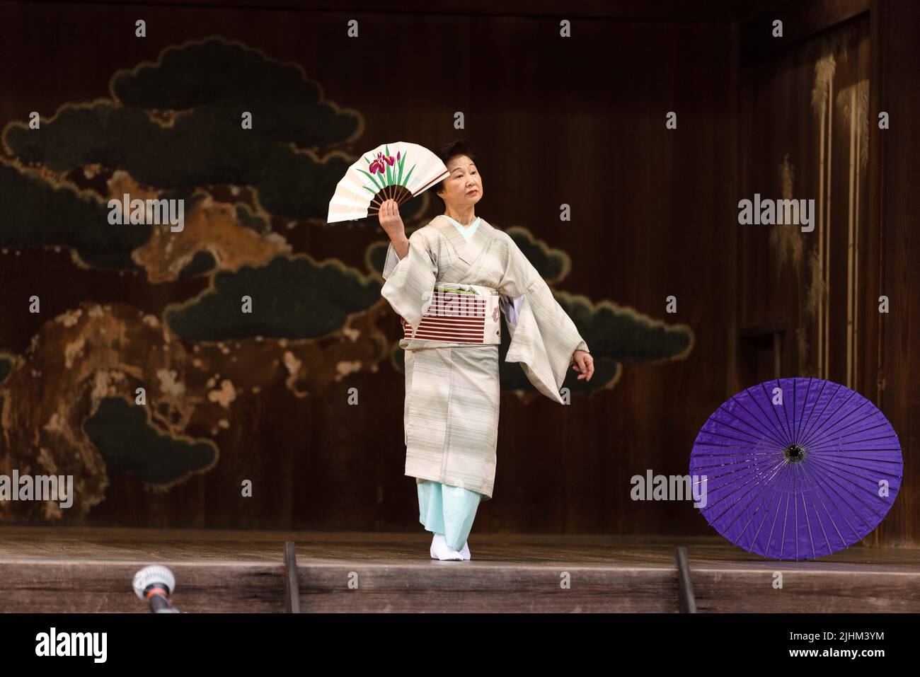 A woman performs a traditional dance during Mitama Matsuri held in ...