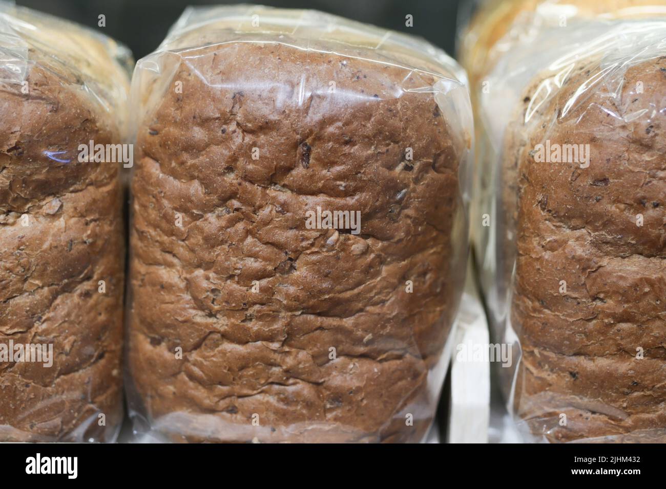 close up of brown bread in a plastic packet Stock Photo - Alamy