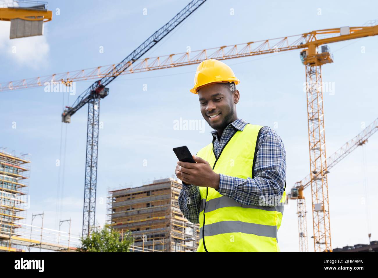 Builder Worker Using Phone. Construction Employee Communication Stock ...