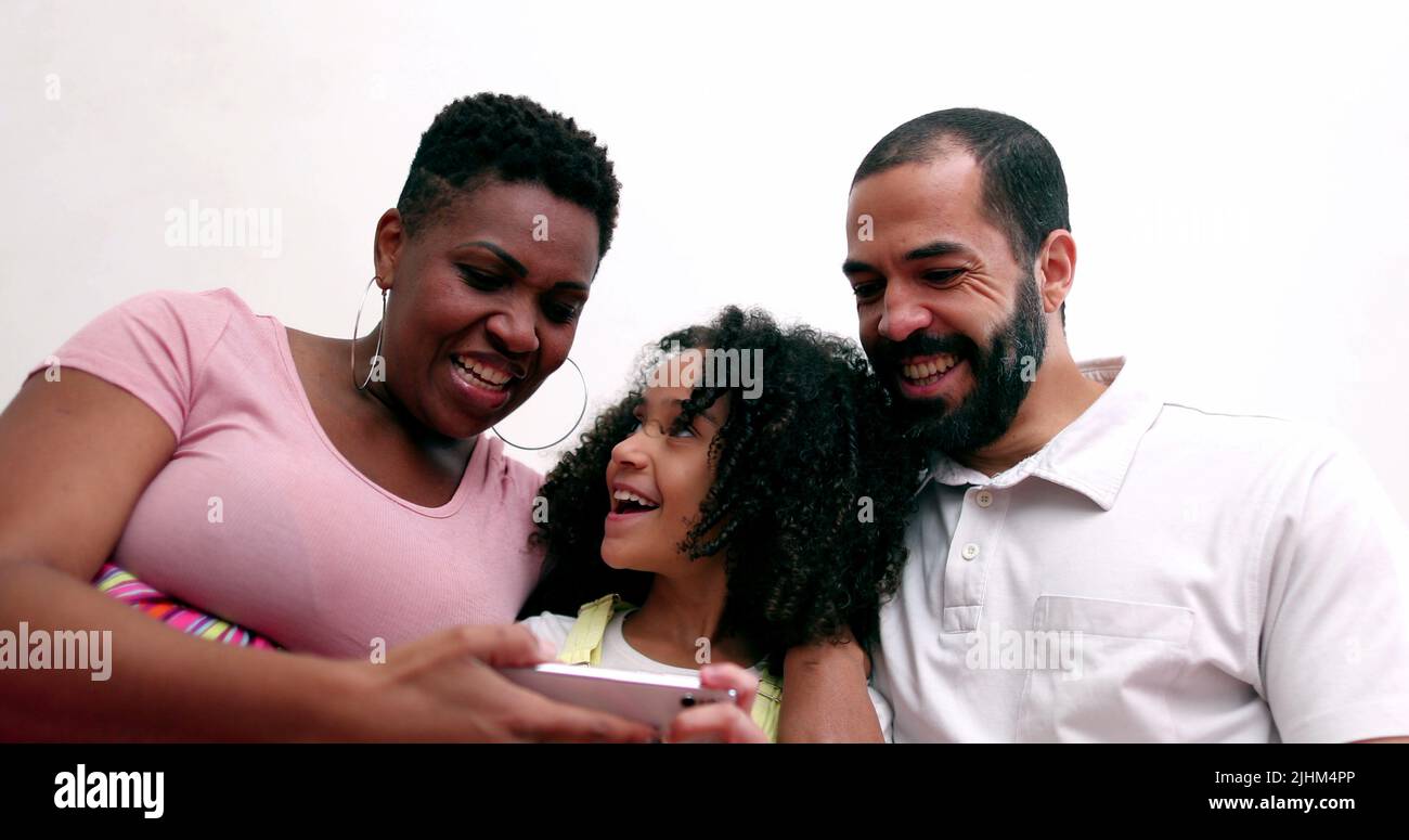 Happy hispanic man walking outside smiling Stock Photo - Alamy
