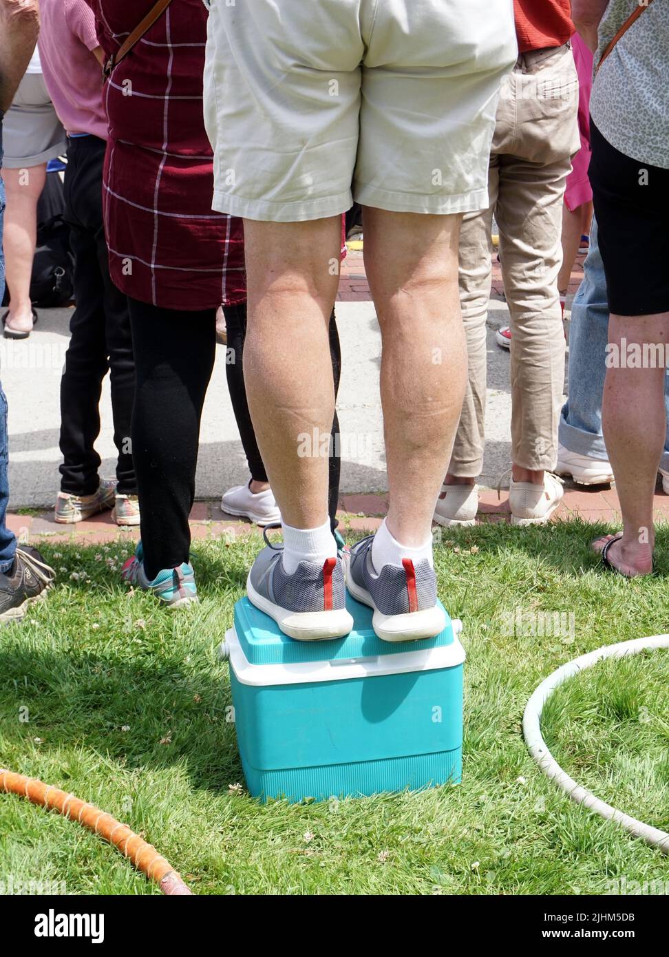 Man standing on a box at a Canada Day parade Stock Photo - Alamy