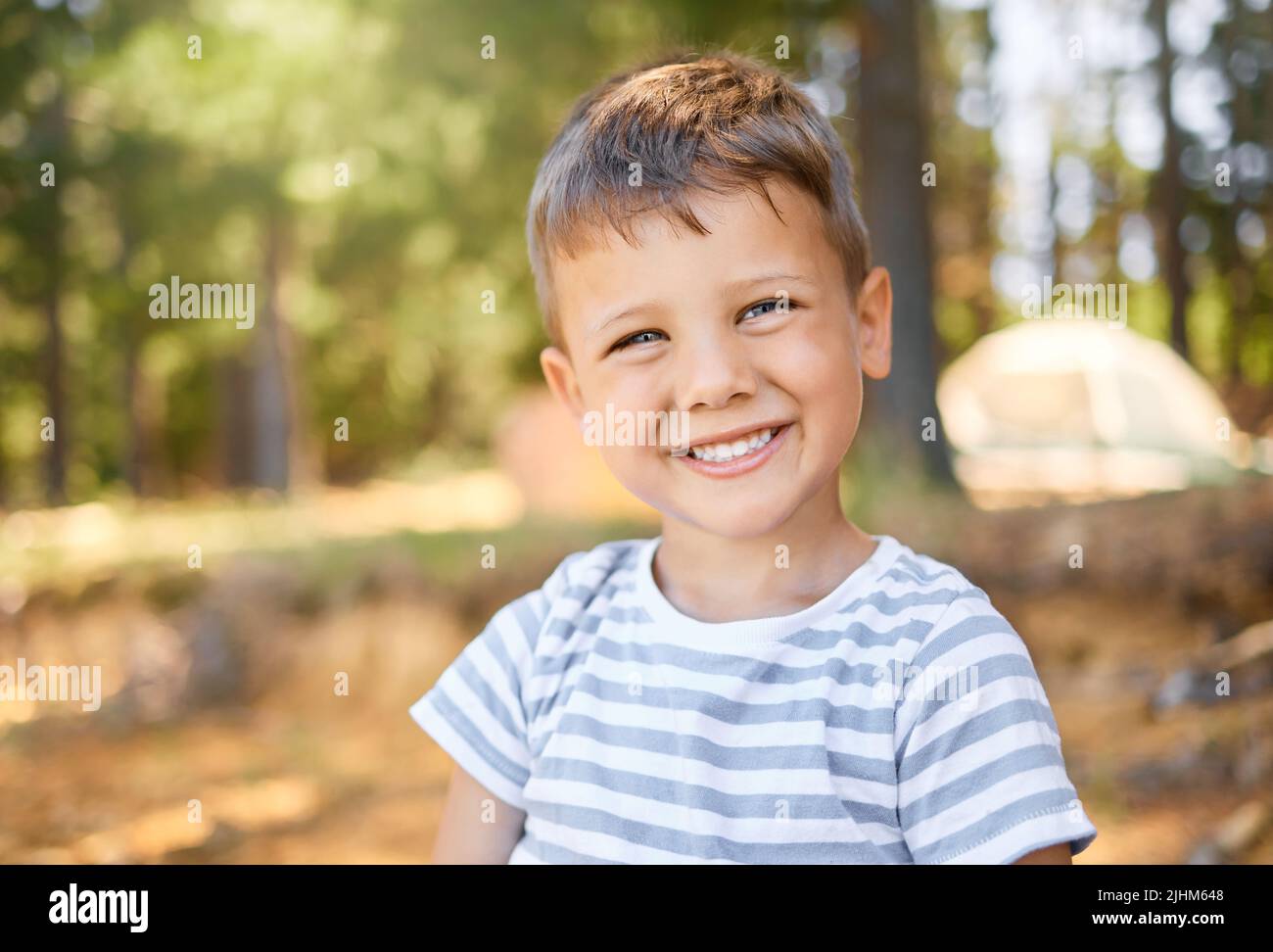 Youll always find him exploring around. Portrait of an adorable little ...