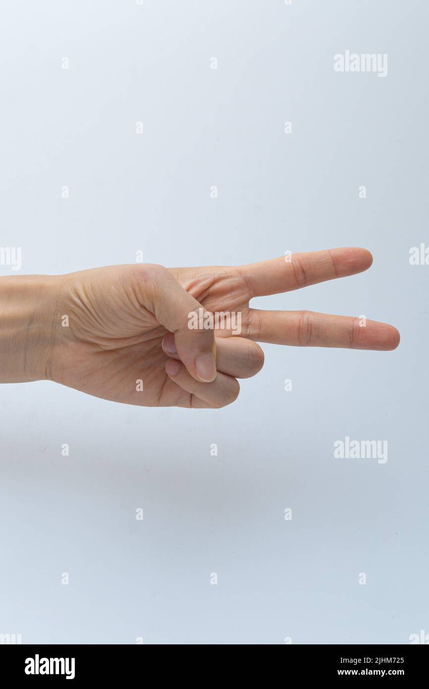 Finger gestures in various actions on a white background Stock Photo ...