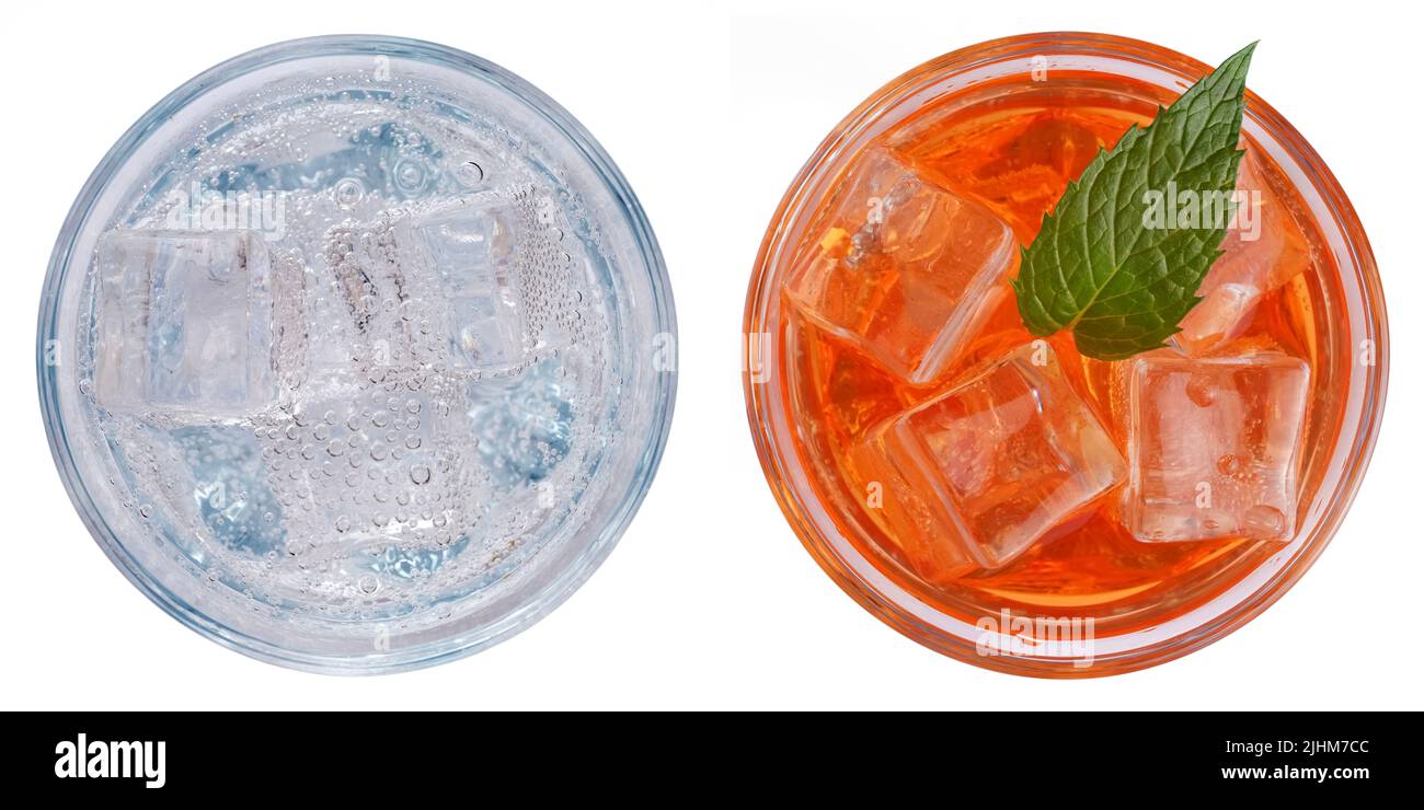 Set of refreshing soft drinks and cocktails with ice in glasses, top ...