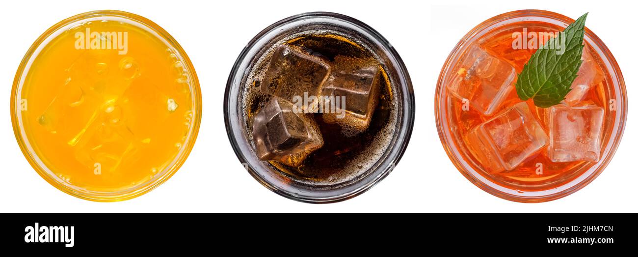 Set of refreshing soft drinks and cocktails with ice in glasses, top ...
