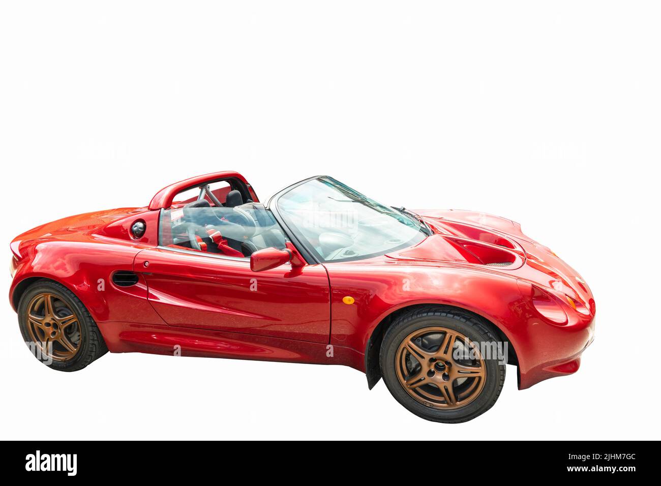 Open top sport car isolated against white background Stock Photo - Alamy