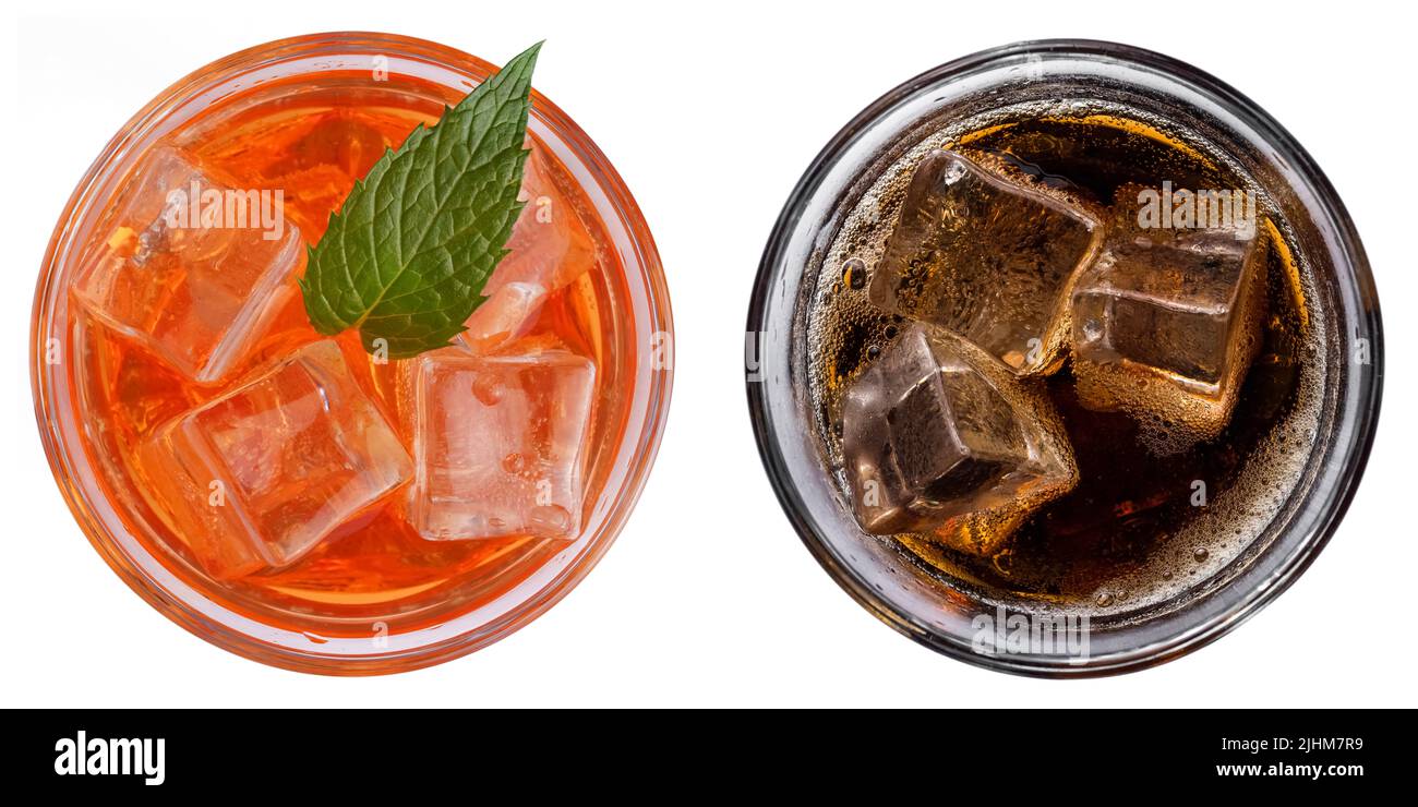 Set of refreshing soft drinks and cocktails with ice in glasses, top ...