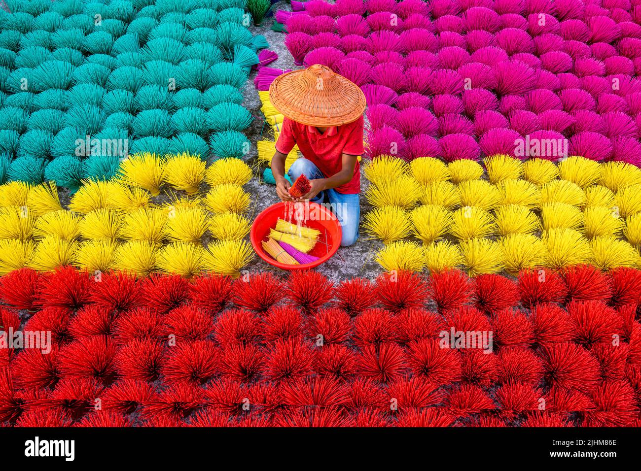 Workers crafting colorful plastic straws from pipes—pattern, texture ...