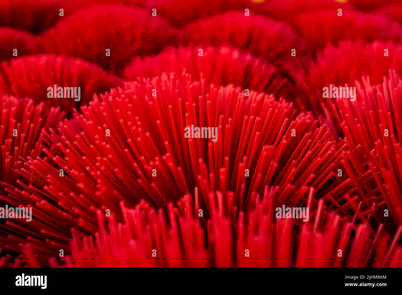 Workers crafting colorful plastic straws from pipes—pattern, texture ...