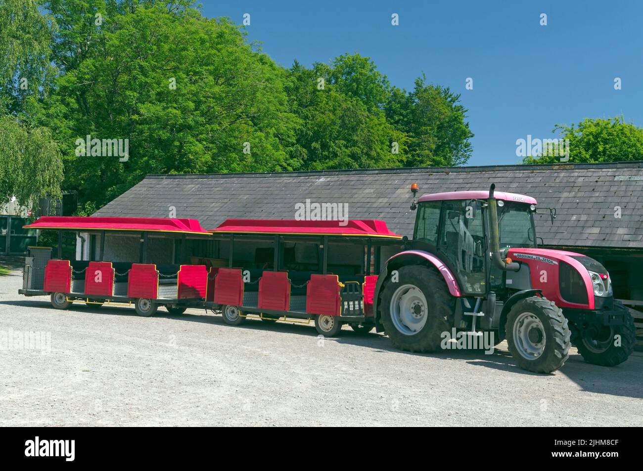 Land train for visitors tours, parked at Llwyn-yr-eos Farm, Grade 2 ...