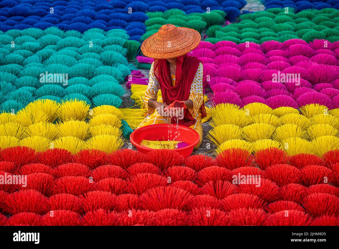Workers crafting colorful plastic straws from pipes—pattern, texture ...