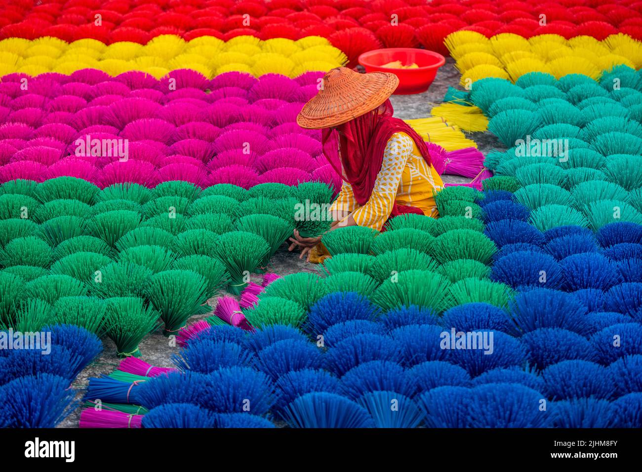 Workers crafting colorful plastic straws from pipes—pattern, texture ...