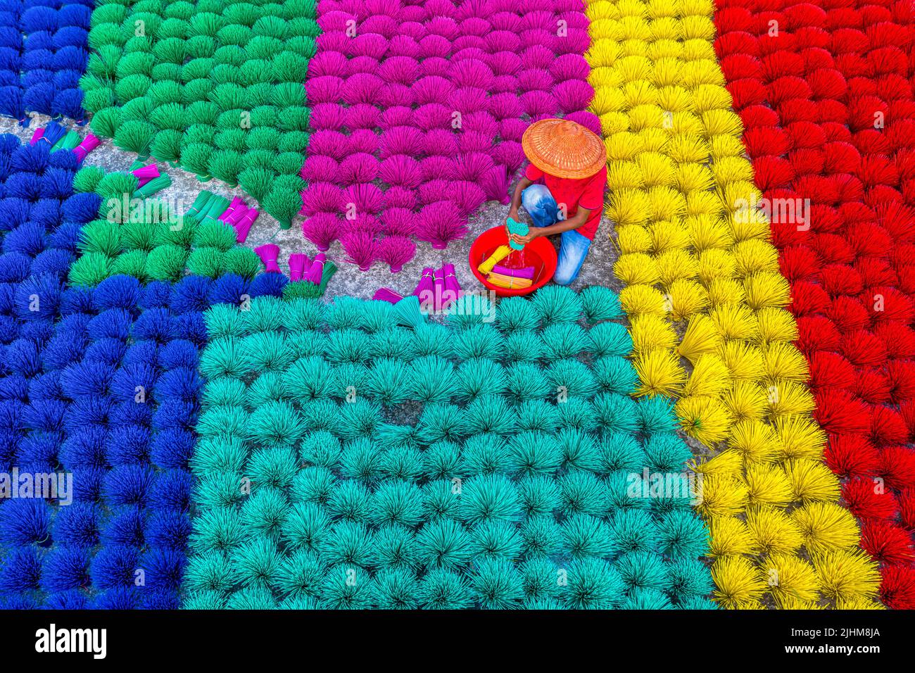 Workers crafting colorful plastic straws from pipes—pattern, texture ...