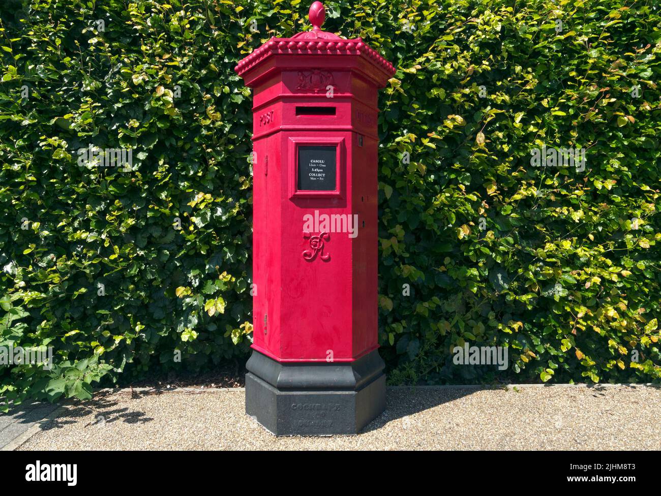 Victorian red pillar box post box at St Fagans Museum, Cardiff. Summer ...