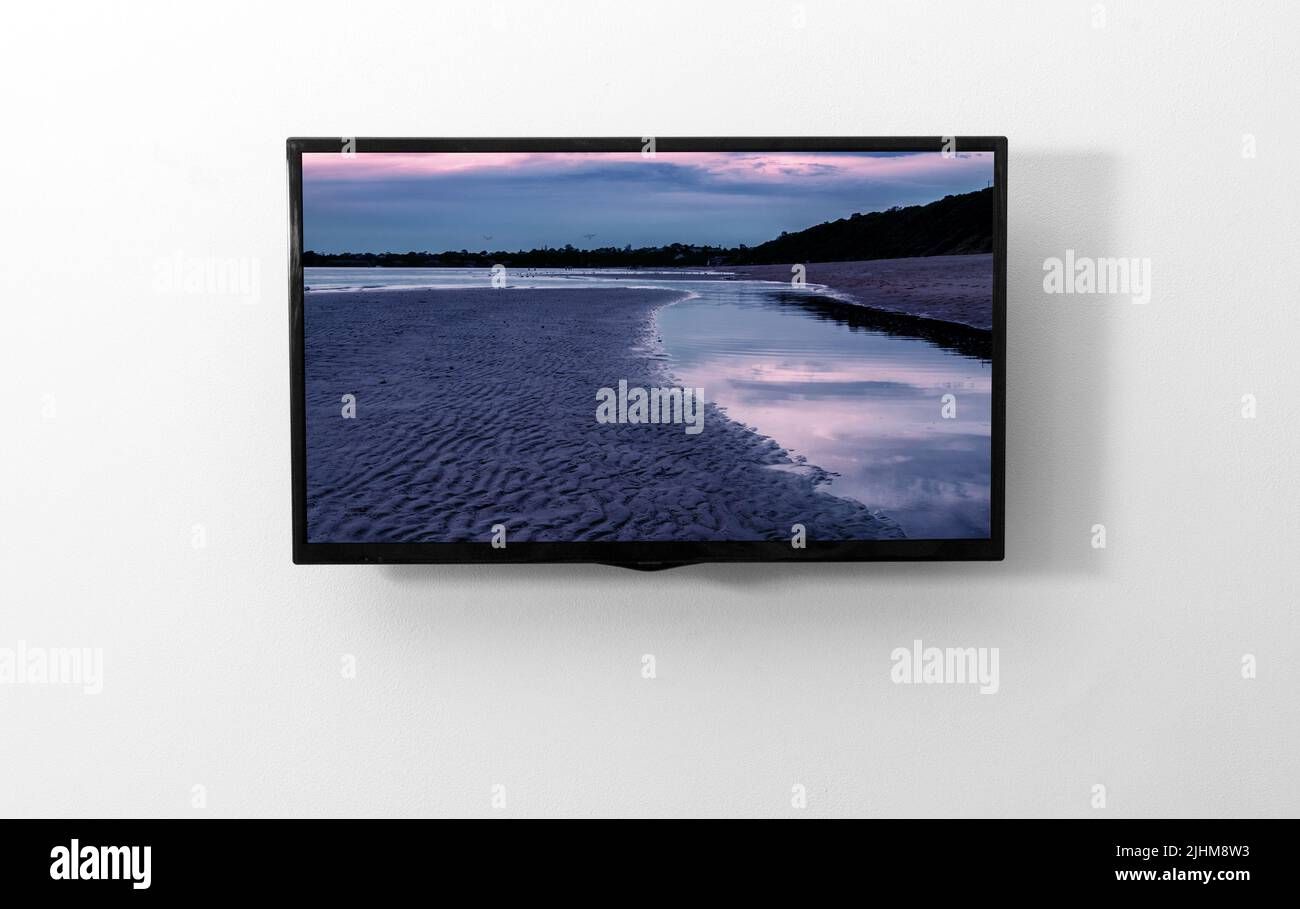TV monitor on the wall Stock Photo - Alamy