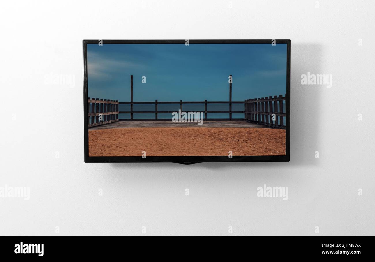 TV monitor on the wall Stock Photo - Alamy
