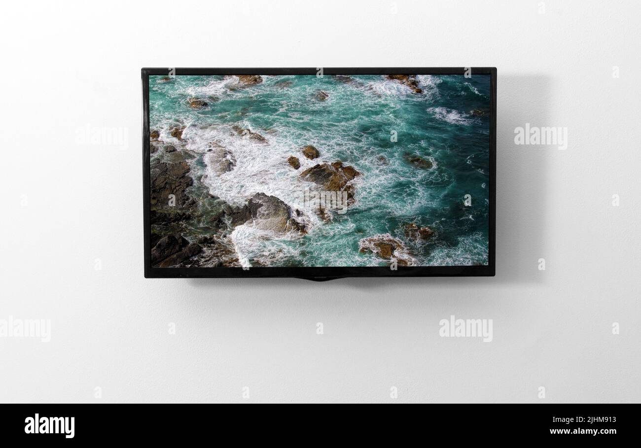 TV monitor on the wall Stock Photo - Alamy
