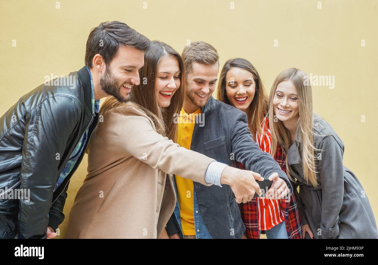 Young people using smartphones - Group of social media co workers ...