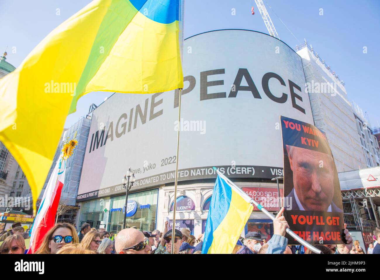 People gather and march during the ‘London Stands with Ukraine’ march ...