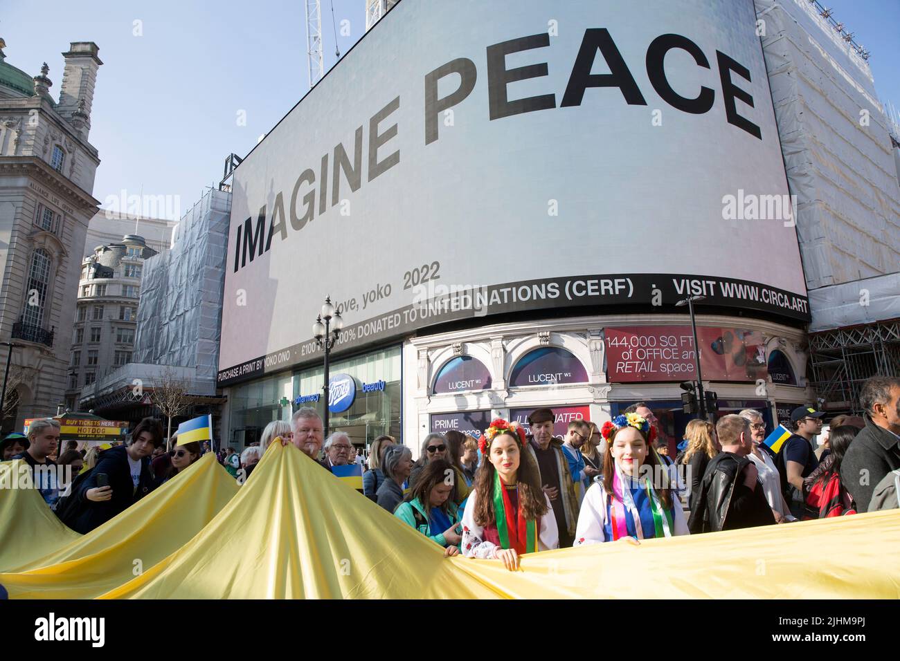 People gather and march during the ‘London Stands with Ukraine’ march ...