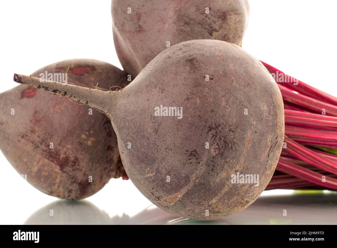 Three sweet red beets, close-up, on a white background Stock Photo - Alamy