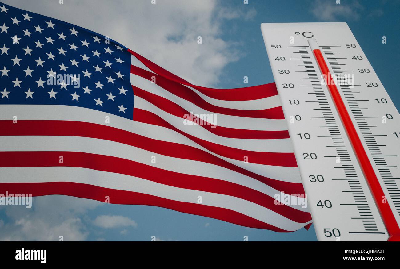 Heat wave in USA, Thermometer in front of flag USA and sky background ...
