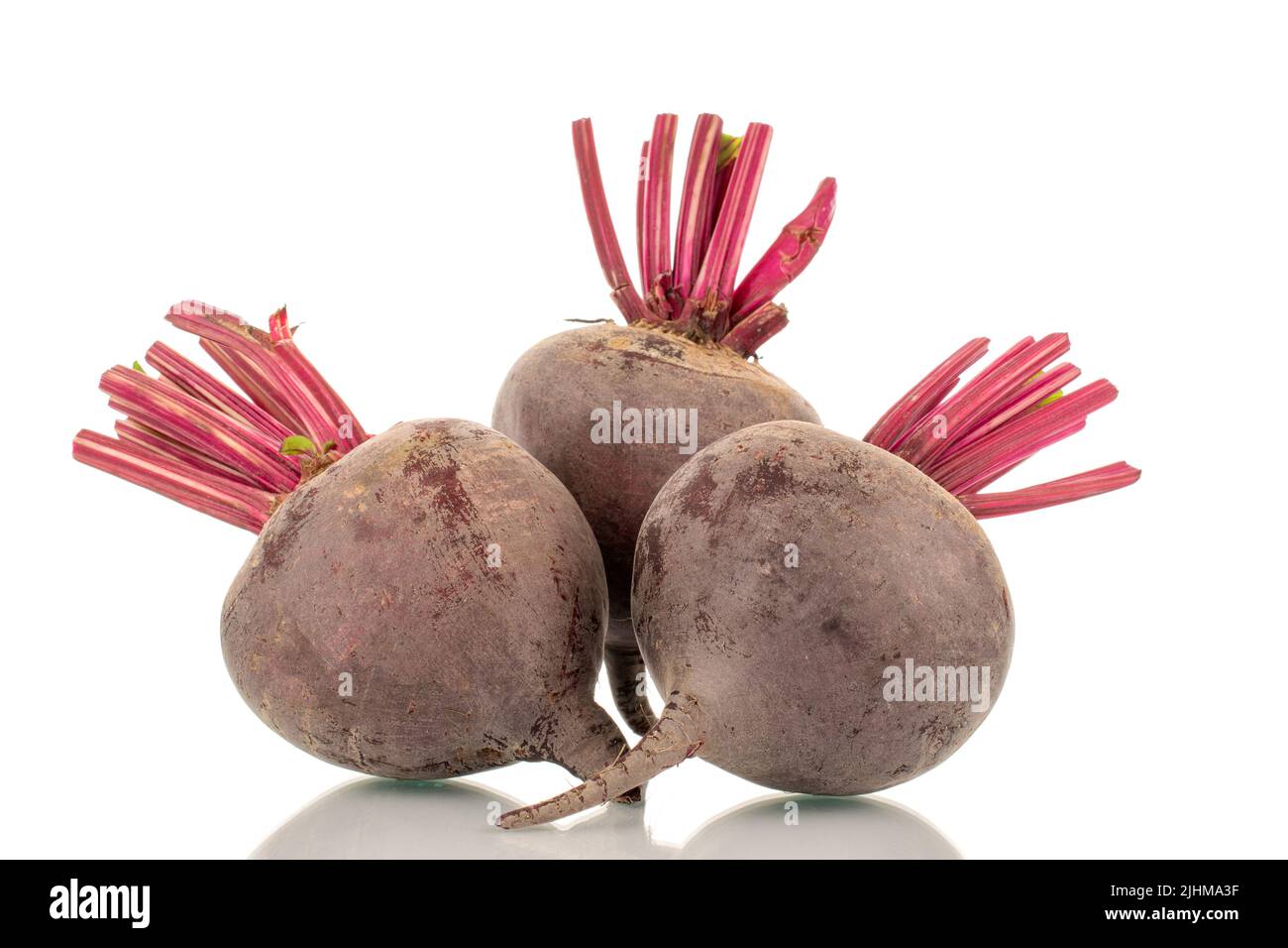 Three sweet red beets, close-up, on a white background Stock Photo - Alamy
